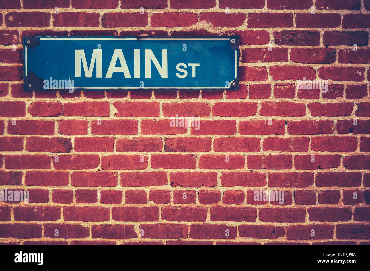 Main Street Sign On A Red Brick Wall Stock Photo - Alamy