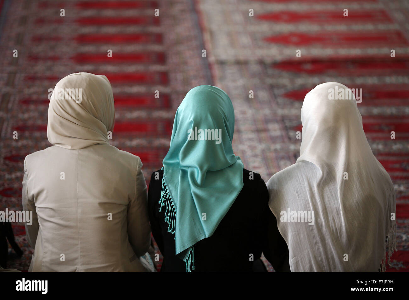Cologne, Germany. 19th Sep, 2014. Islamic women pray in a mosque in ...