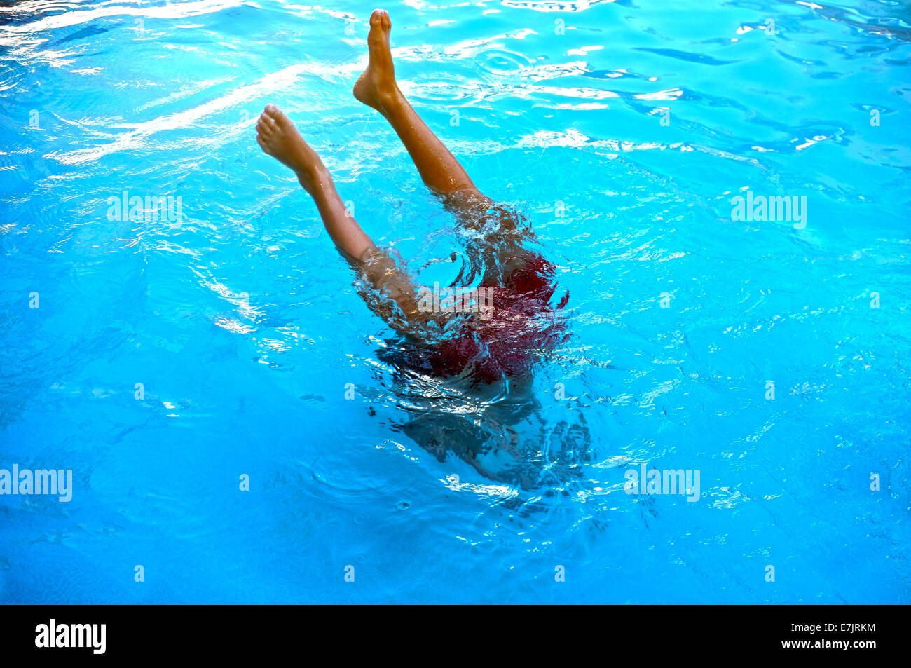Young teenage boy diving to pool Stock Photo - Alamy