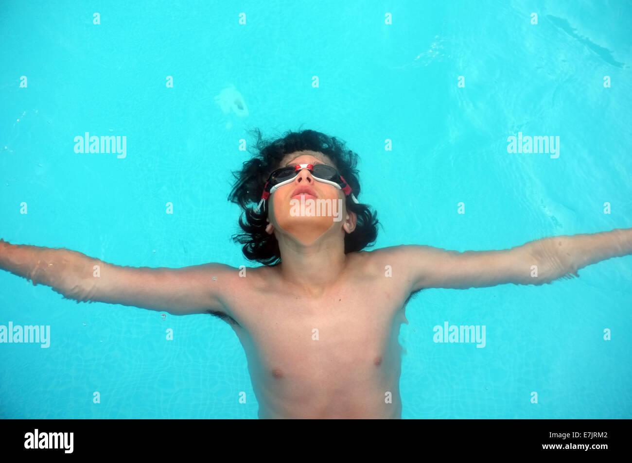 Boy floats hi-res stock photography and images - Alamy
