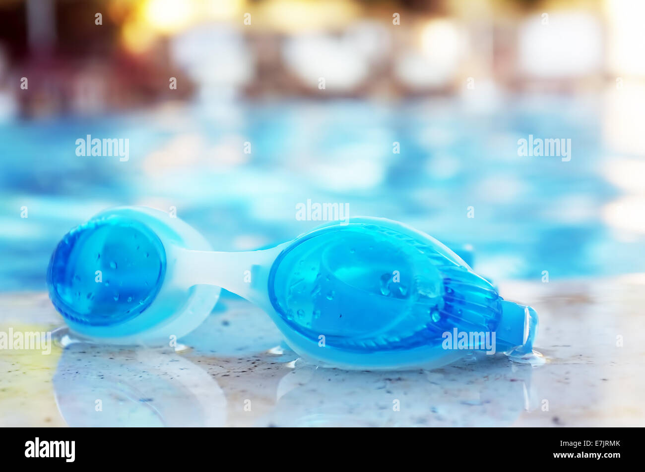 Blue goggles by the pool Stock Photo - Alamy