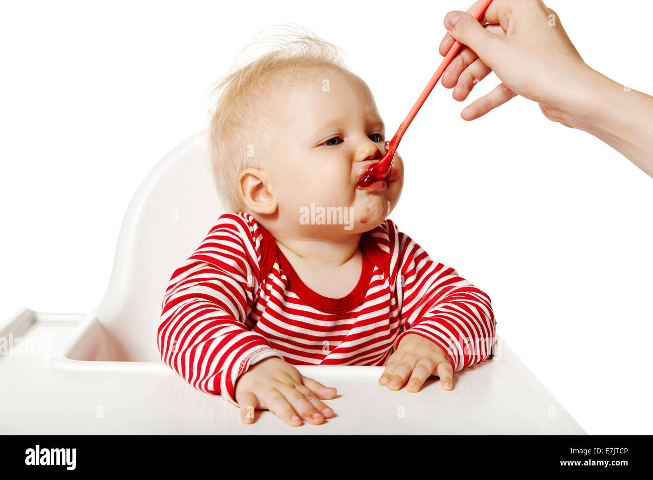 Baby eating lunch hi-res stock photography and images - Alamy