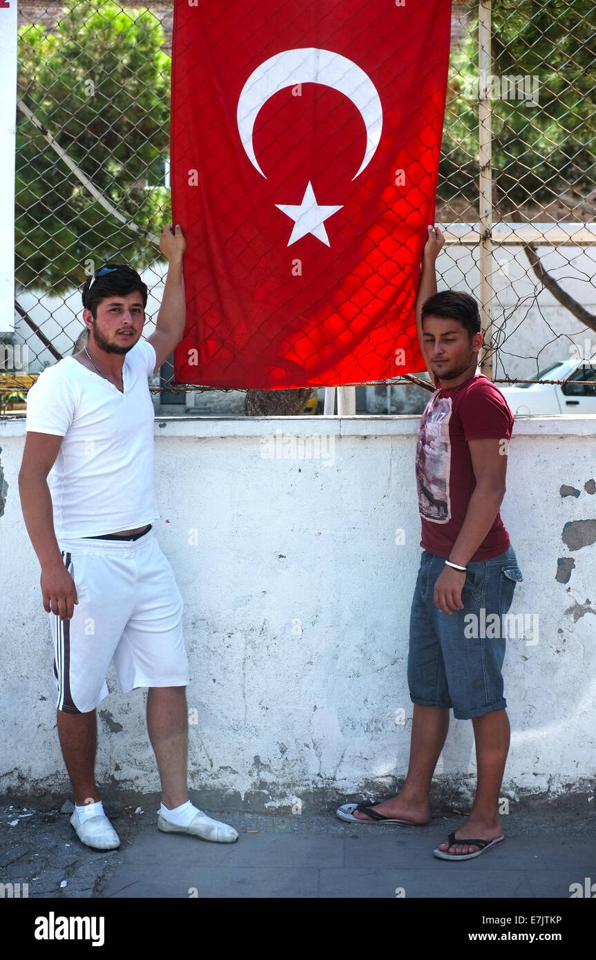 Two teen Turkish boys with their national flag Stock Photo - Alamy