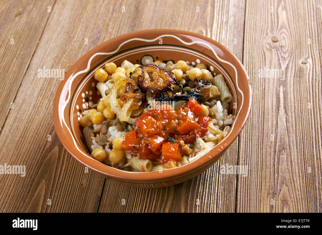 Kushari - is an Egyptian dish of rice, macaroni and lentils mixed ...