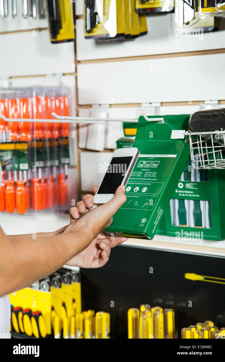 Hands Scanning Product's Barcode Through Cellphone Stock Photo - Alamy