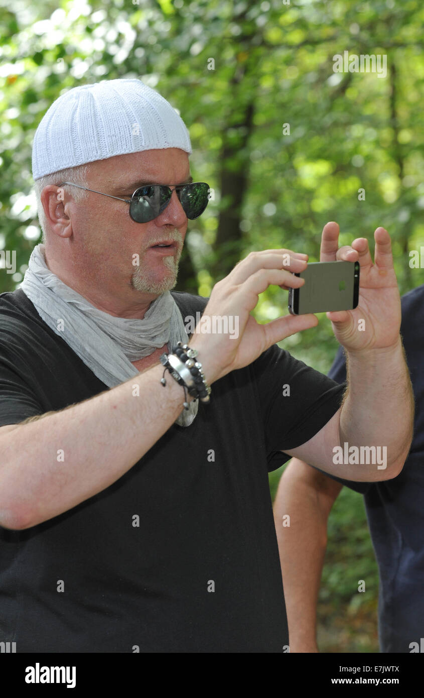 Munich, Germany. 19th Sep, 2014. Austrian singer DJ Oetzi poses during ...