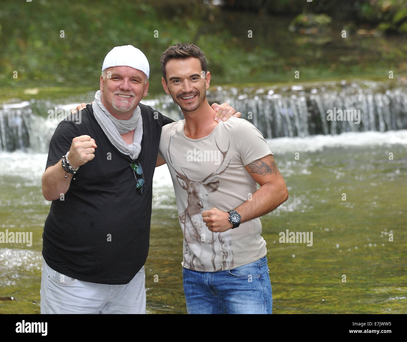 Munich, Germany. 19th Sep, 2014. TV host Florian Silbereisen (R) and ...