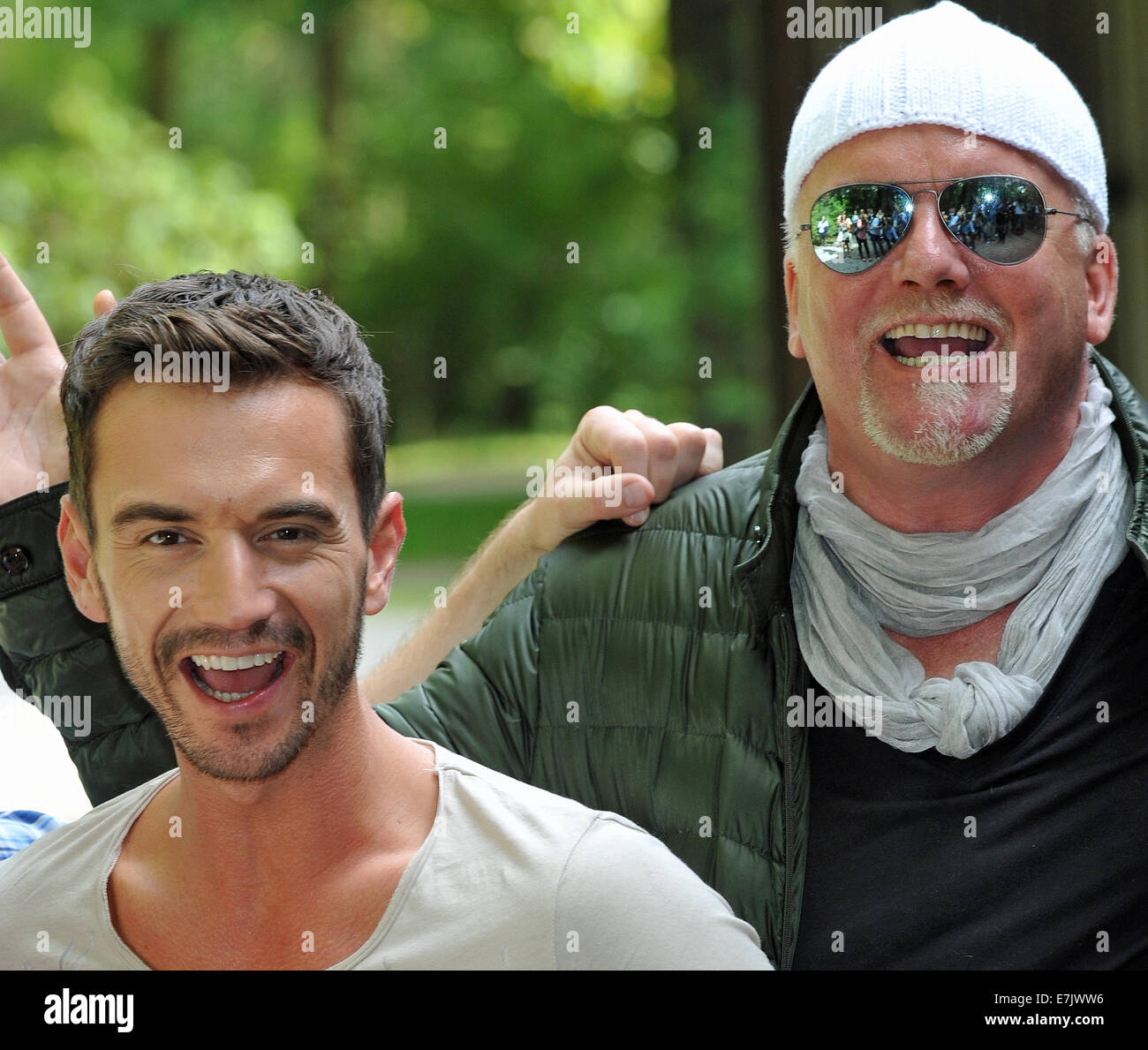Munich, Germany. 19th Sep, 2014. TV host Florian Silbereisen (L) and ...
