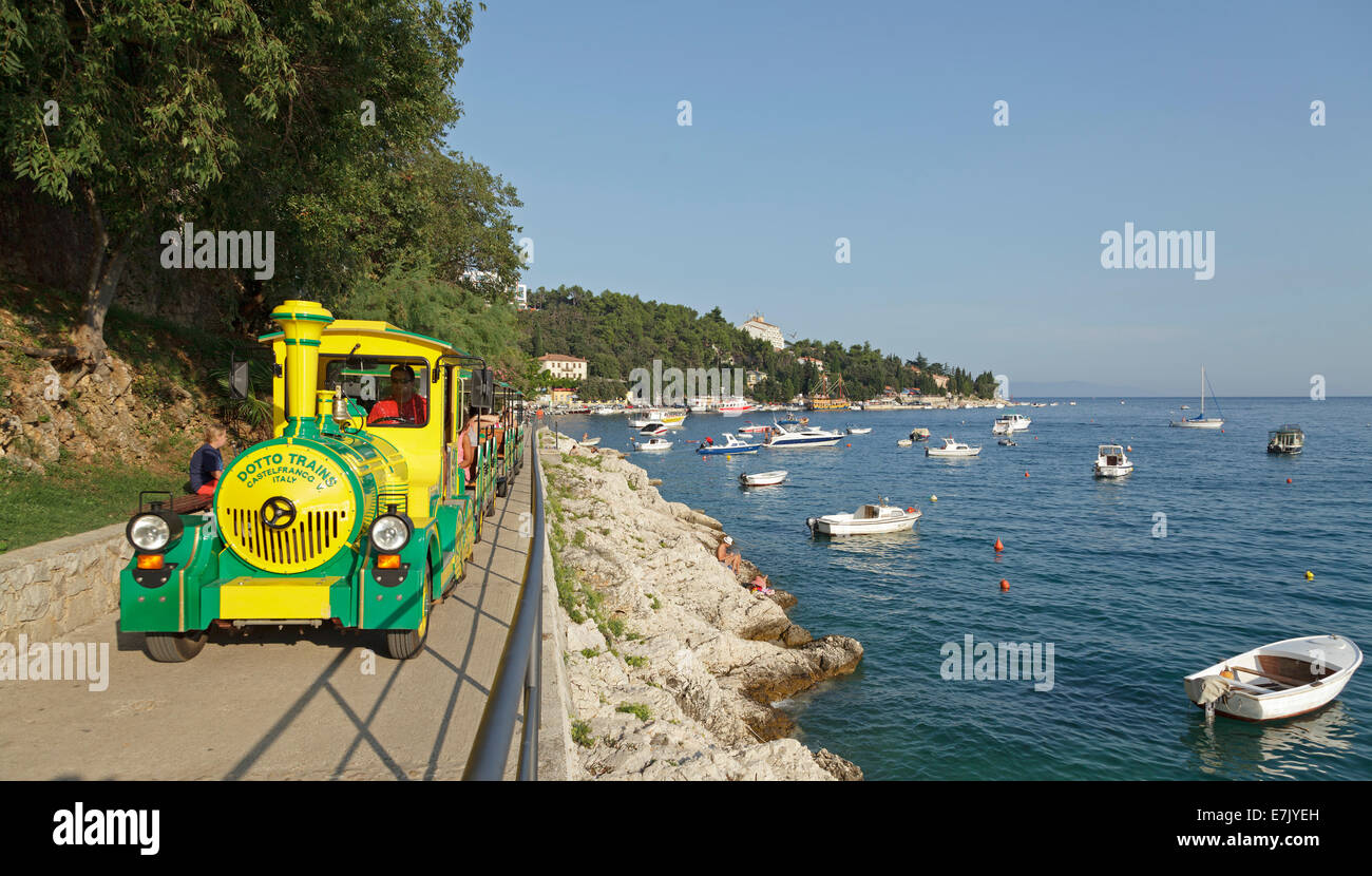 tourist train on the boardwalk, seafront, Rabac, Istria, Croatia Stock ...