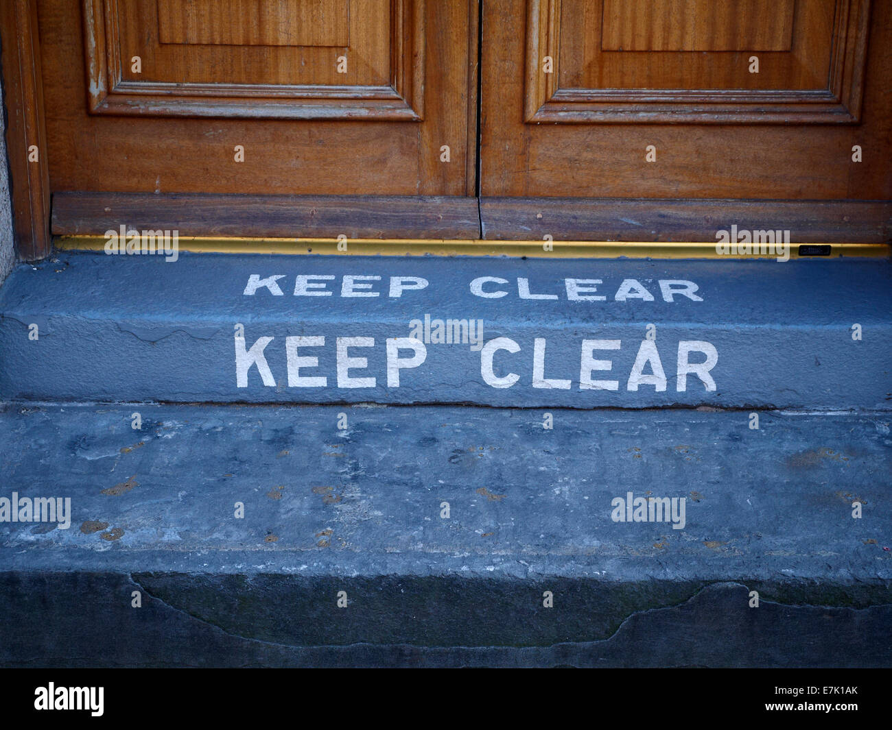 Keep Clear painted, twice, on front door steps in Aberystwyth ...