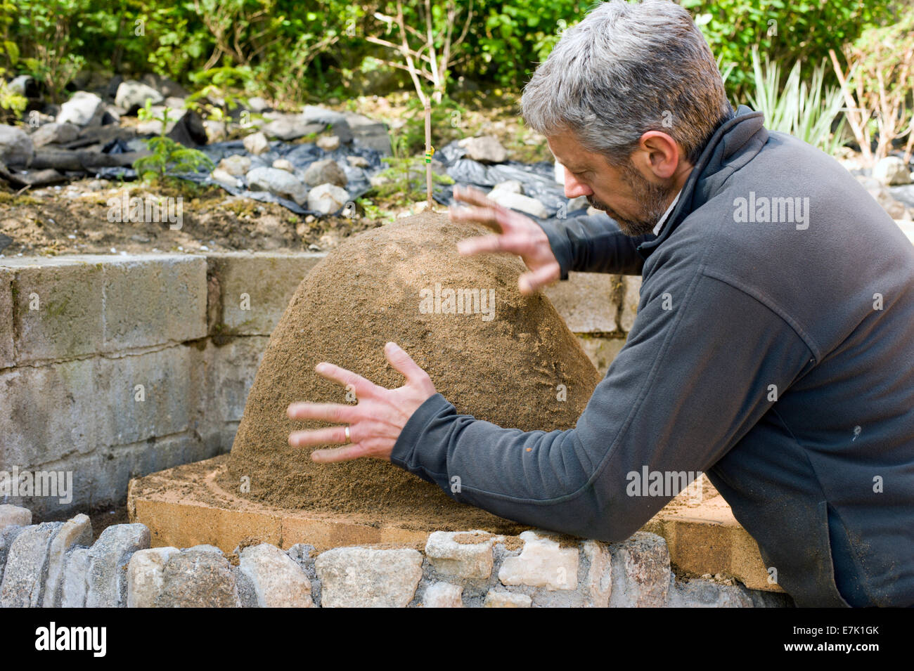 Earth clay cob oven project. Once the base and fire bricks have been ...