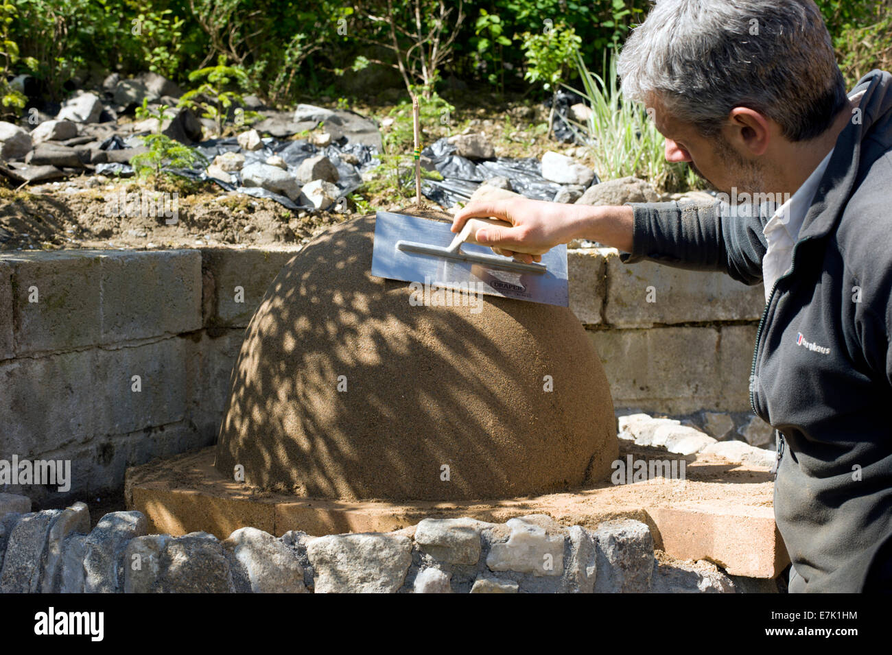 Earth clay cob oven project. Once the base and fire bricks have been ...