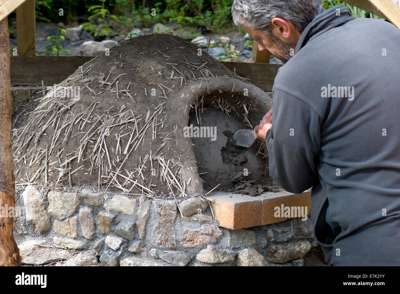 Earth clay cob oven project. Now that the first clay or cob layer is ...