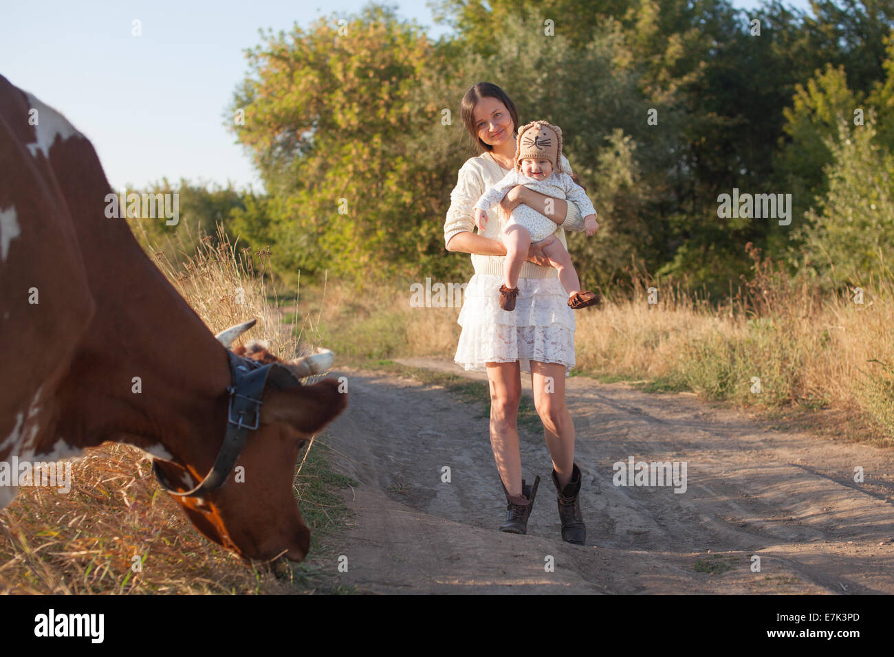 baby meets a cow Stock Photo - Alamy