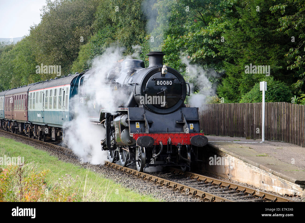 Steam engine at station on heritage railway Stock Photo - Alamy