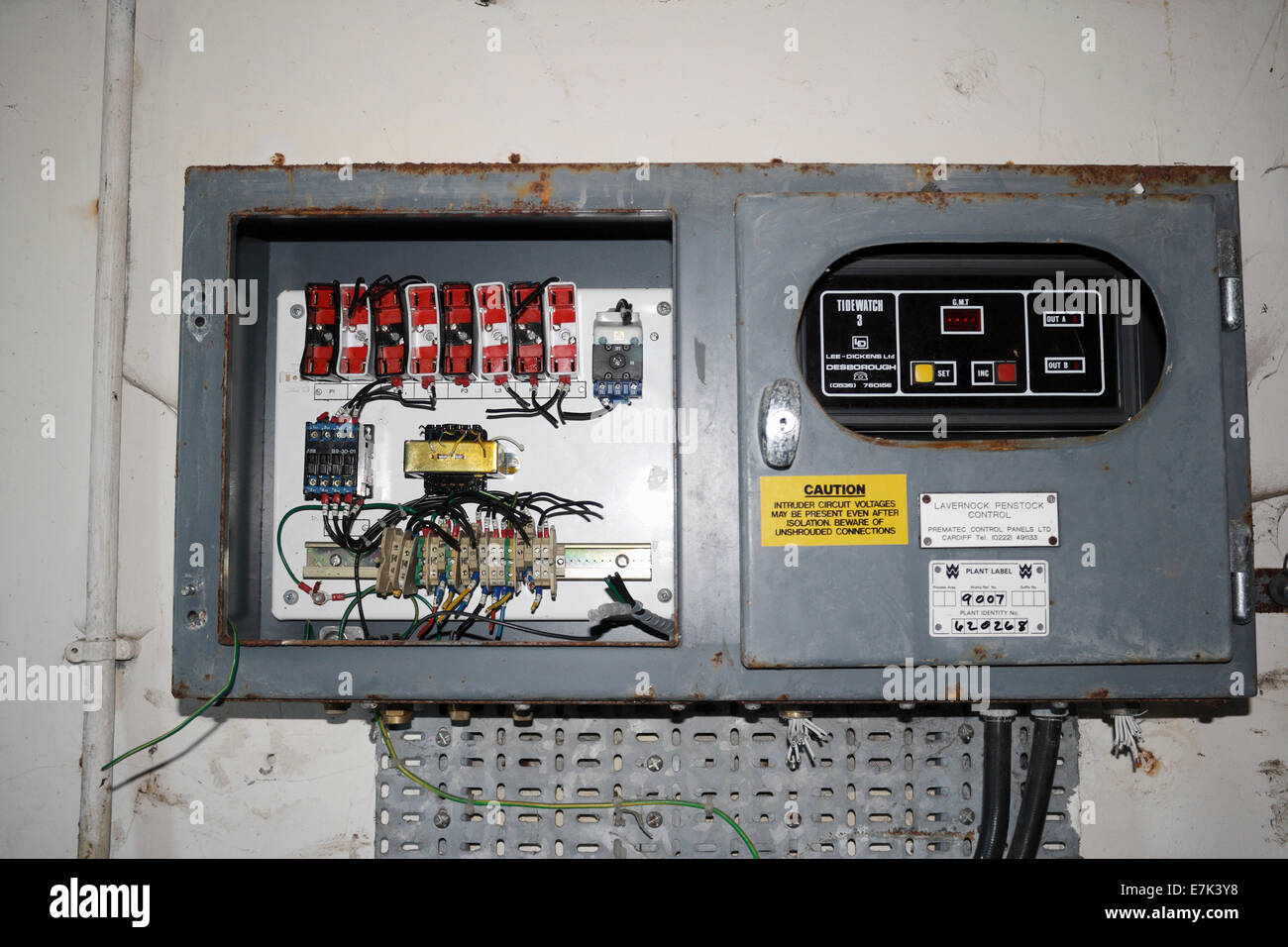 A vandalised distribution / fuse box / electricity supply in an old ...
