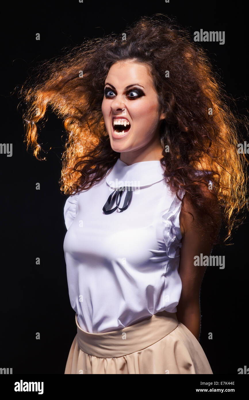 angry screaming vampire woman in dark Stock Photo - Alamy