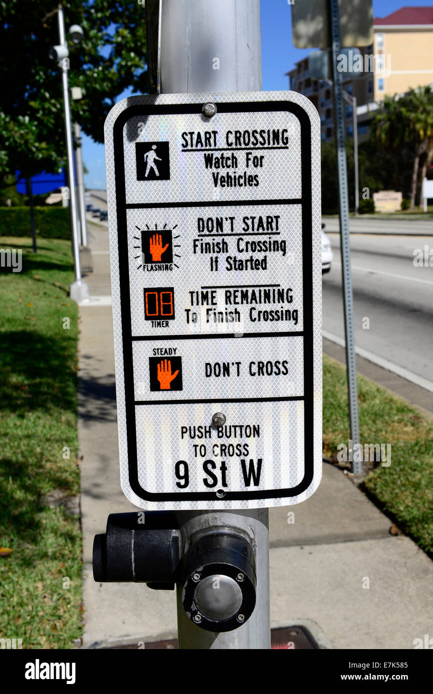 Crossing station at a busy intersection for pedistrians to cross road ...