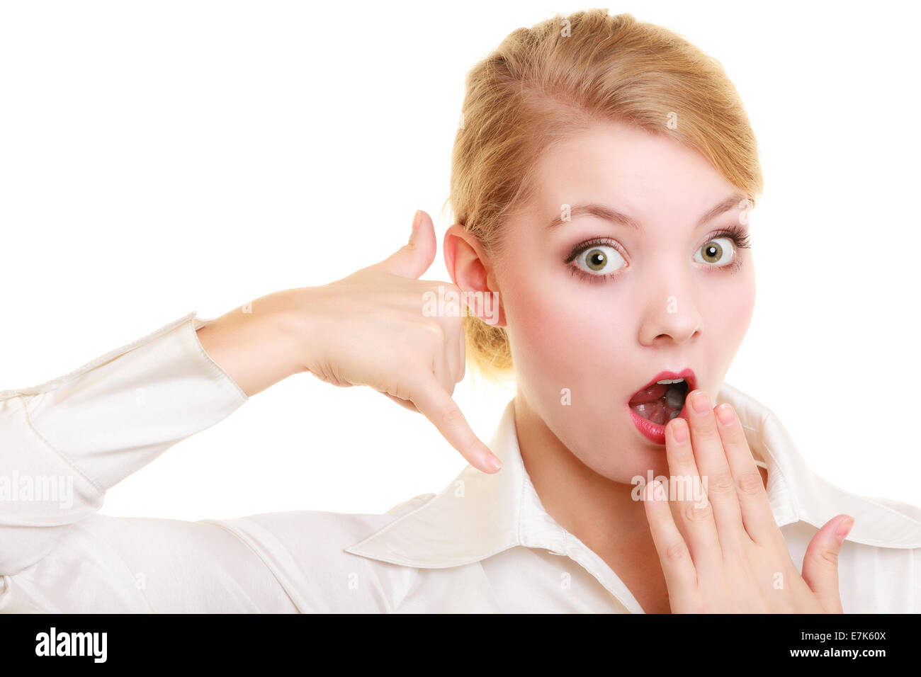 Surprised businesswoman making call me gesture. Shocked girl with phone ...