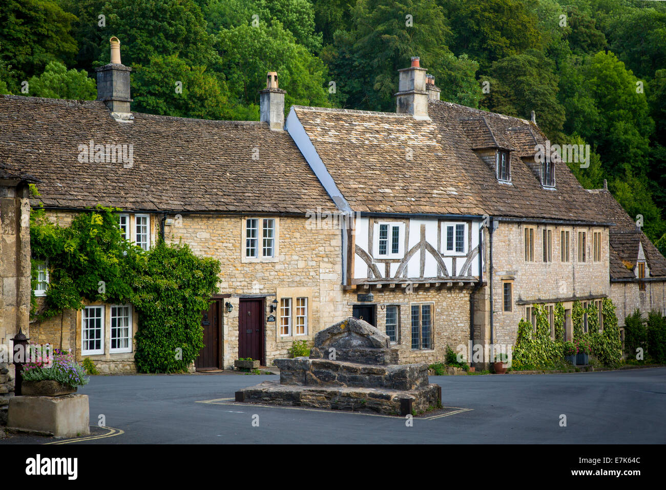 Homes and shops along the High Street, Castle Combe, the Cotswolds ...