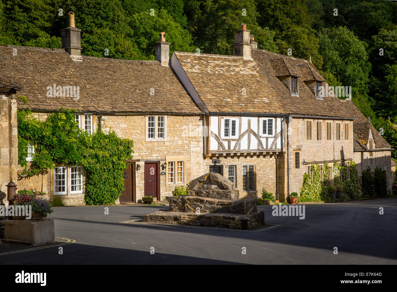 Homes and shops along the High Street, Castle Combe, the Cotswolds ...