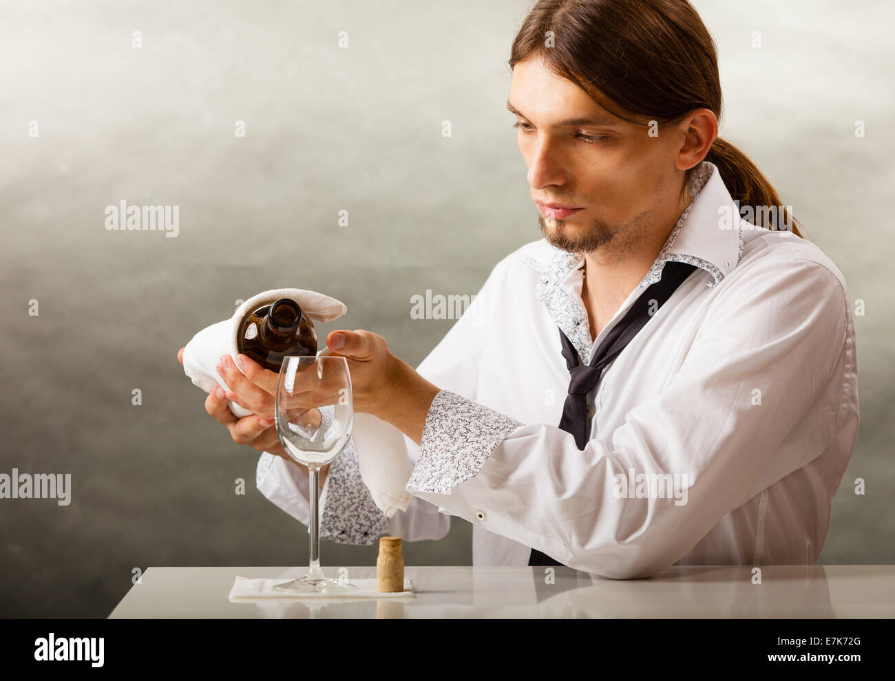Male waiter butler serving pouring hi-res stock photography and images ...