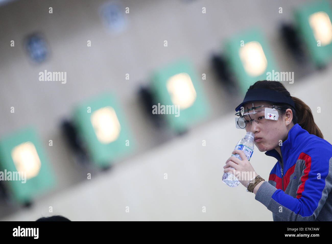 Incheon, South Korea. 20th Sep, 2014. Guo Wenjun of China drinks water ...