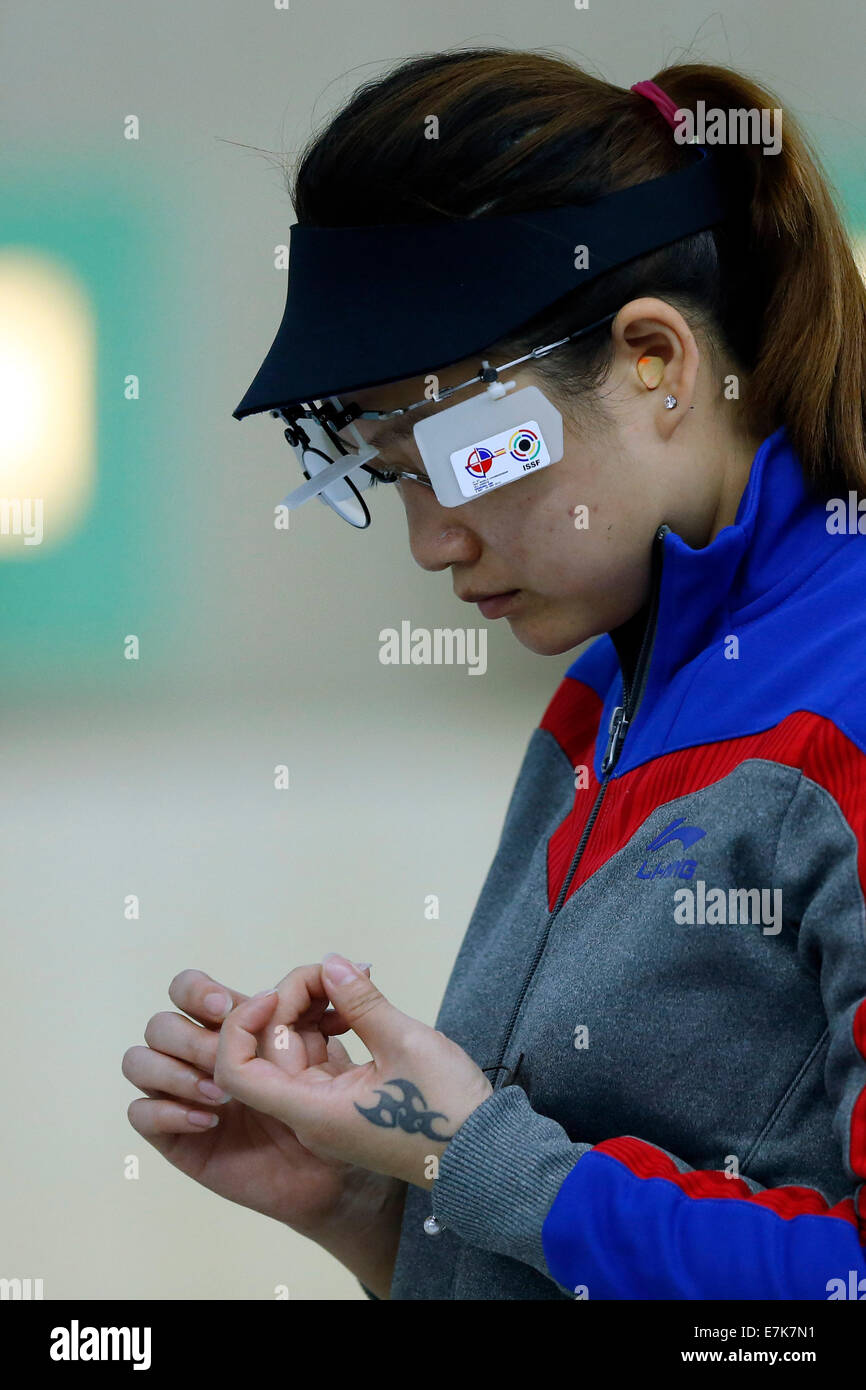 Incheon, South Korea. 20th Sep, 2014. Guo Wenjun of China reacts during ...
