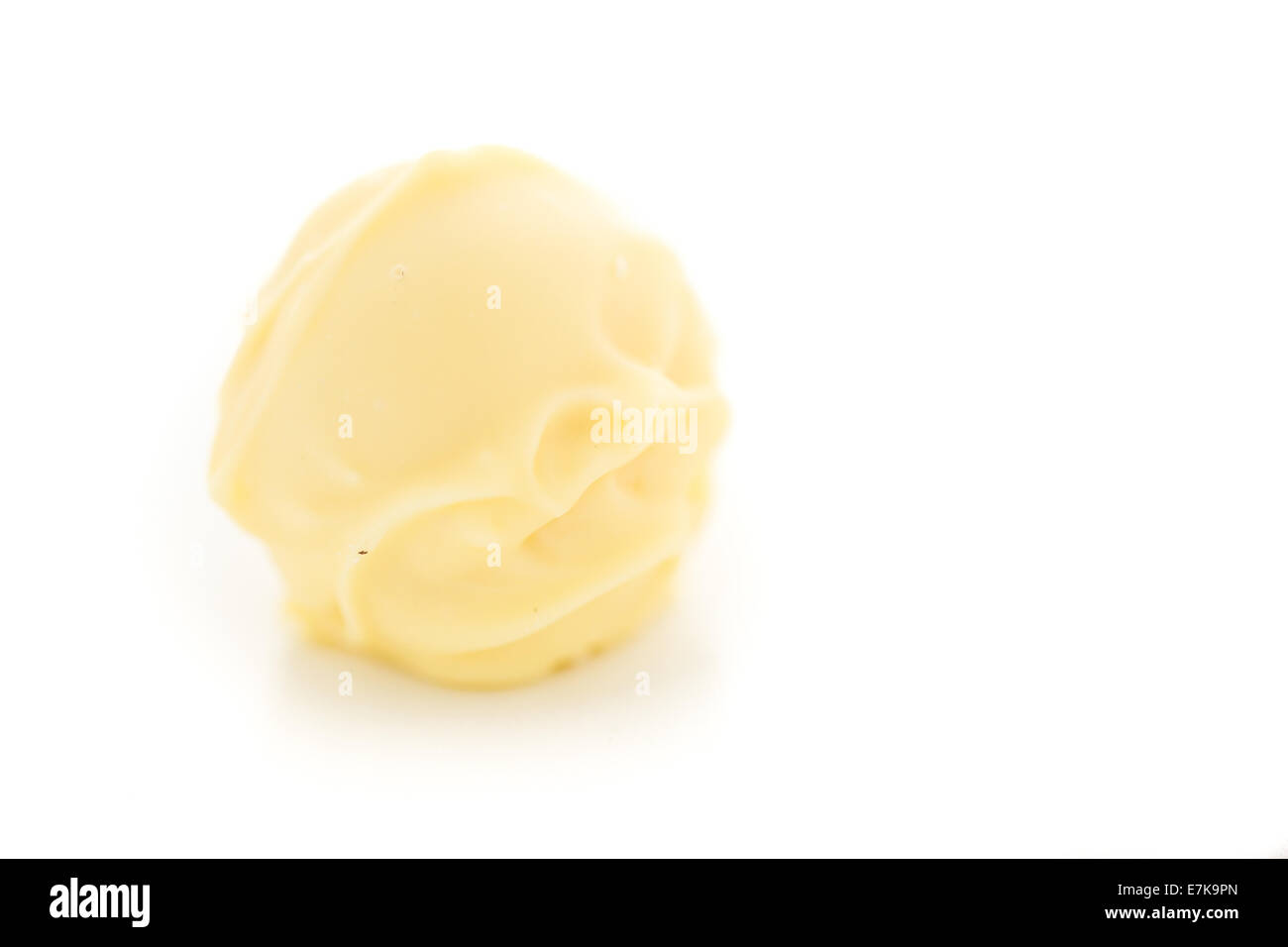 Gourmet white chocolate truffles on a white background Stock Photo - Alamy