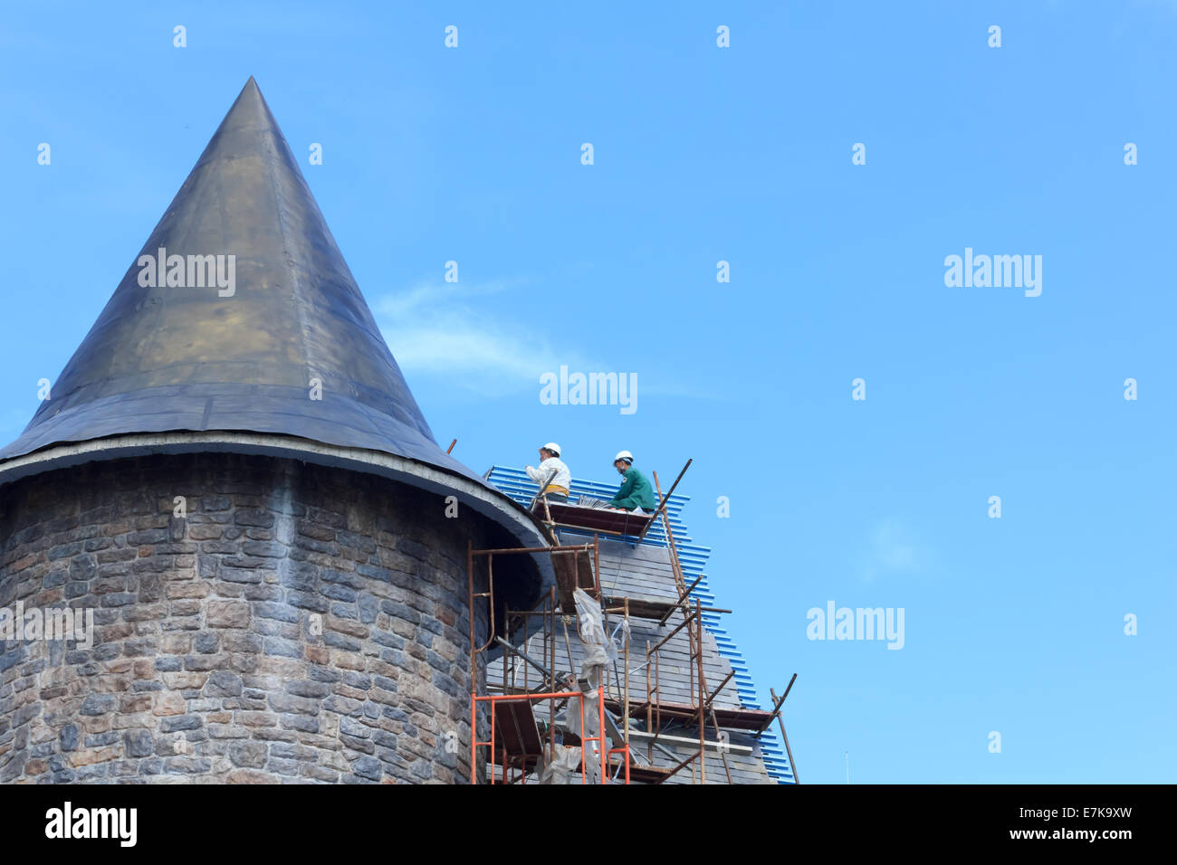 Workers are build towers Stock Photo - Alamy