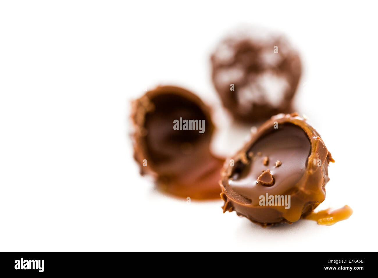 Gourmet milk salted liquid caramel truffle on a white background Stock ...