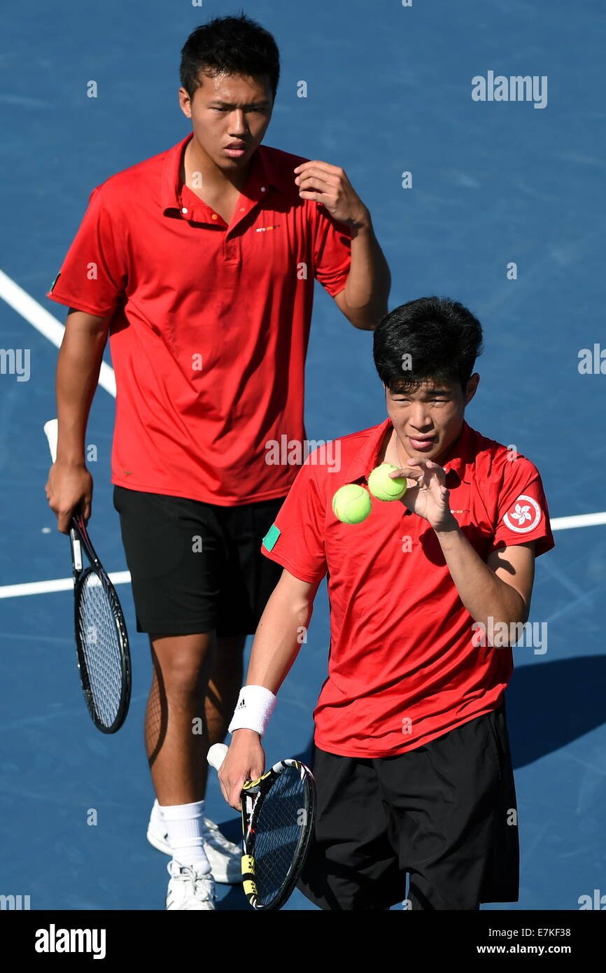 Incheon, South Korea. 20th Sep, 2014. Yeung Pak Long (upper) and Wong ...
