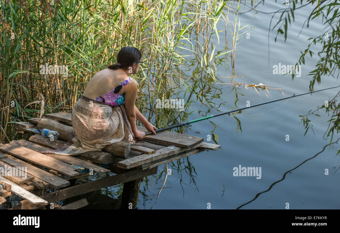 Fishing lake woman hi-res stock photography and images - Alamy