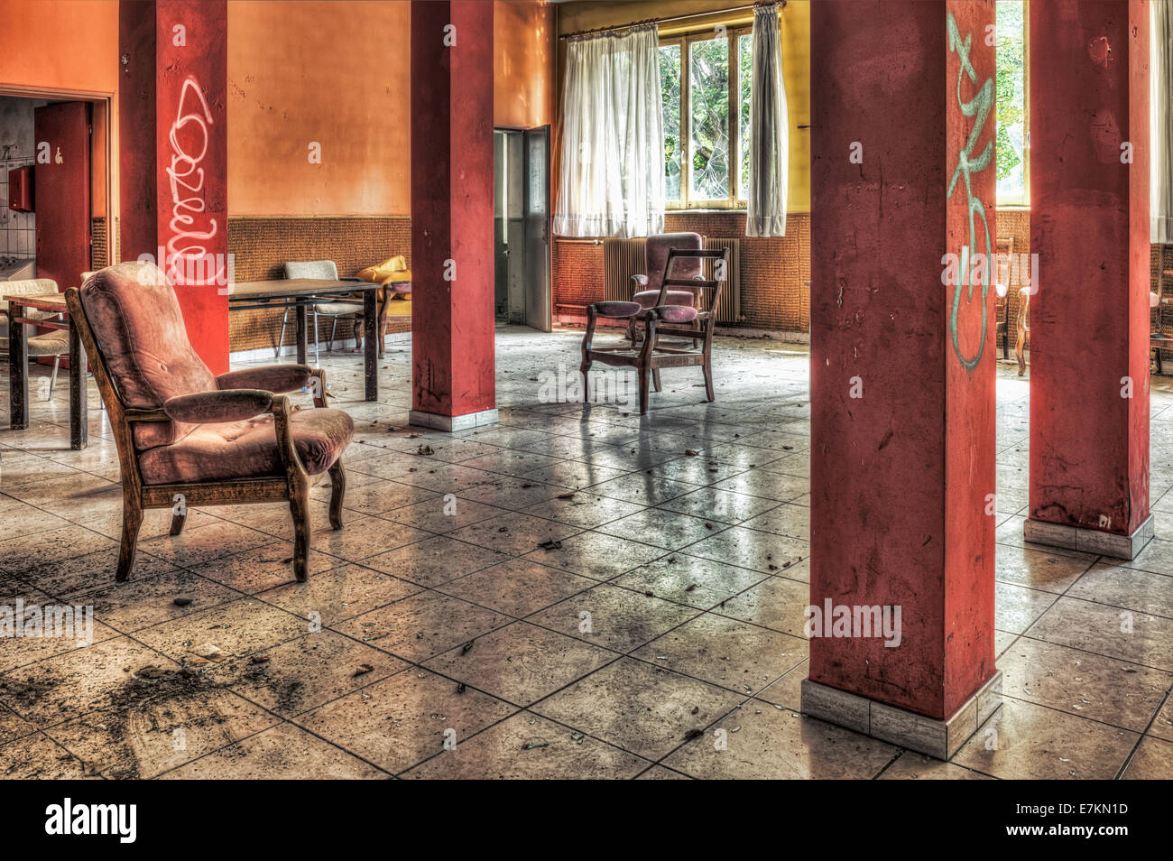Dilapidated sitting room in an abandoned hospital Stock Photo - Alamy