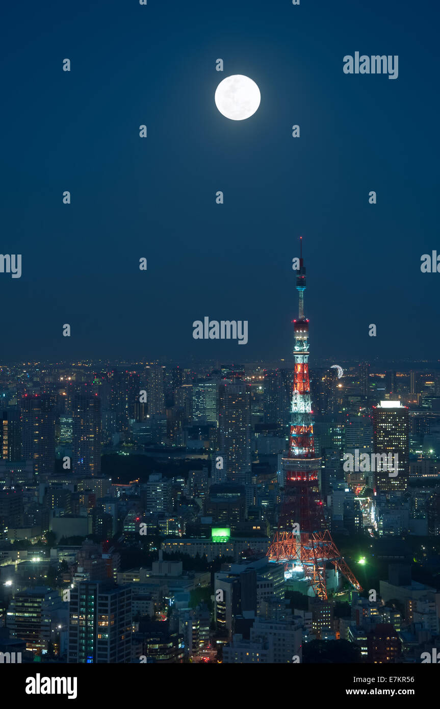 A full moon hangs over the Tokyo cityscape at night Stock Photo - Alamy