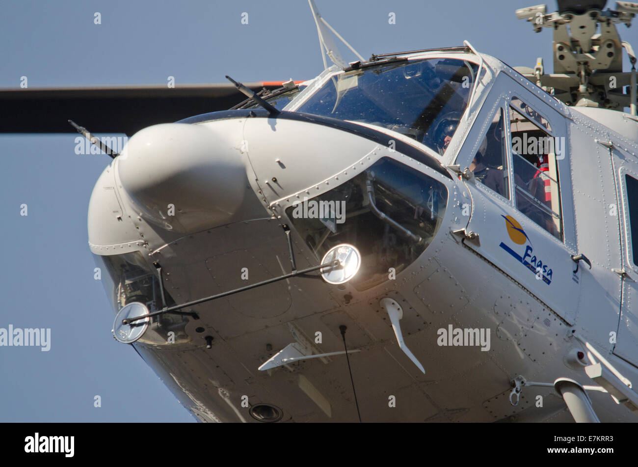 Aerial Firefighting with helicopter water bombing a bushfire near an ...