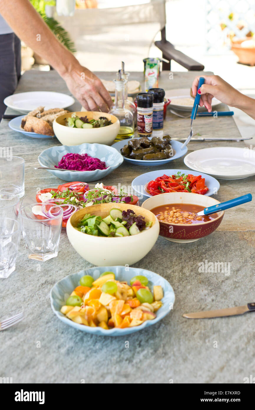 Various dishes on an outside dining tabke Stock Photo - Alamy