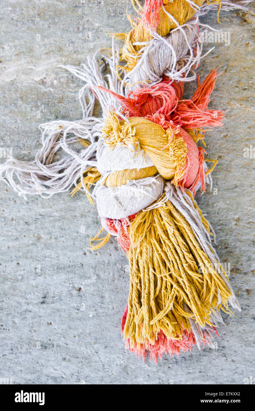 Knot in a piece of colorful rope Stock Photo - Alamy
