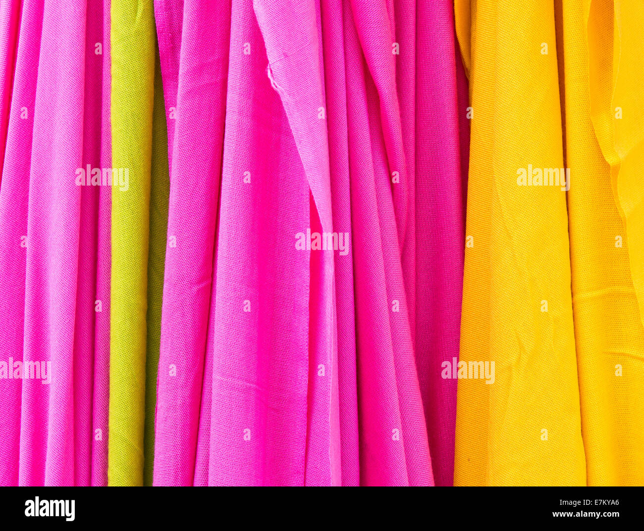 Selection of bright colorful cloths as a background Stock Photo - Alamy