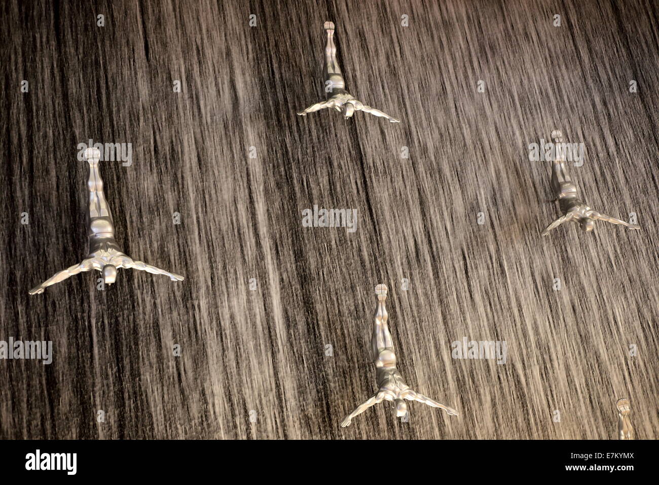 Waterfall with statues of divers in the Dubai Mall, Dubai, United Arab ...