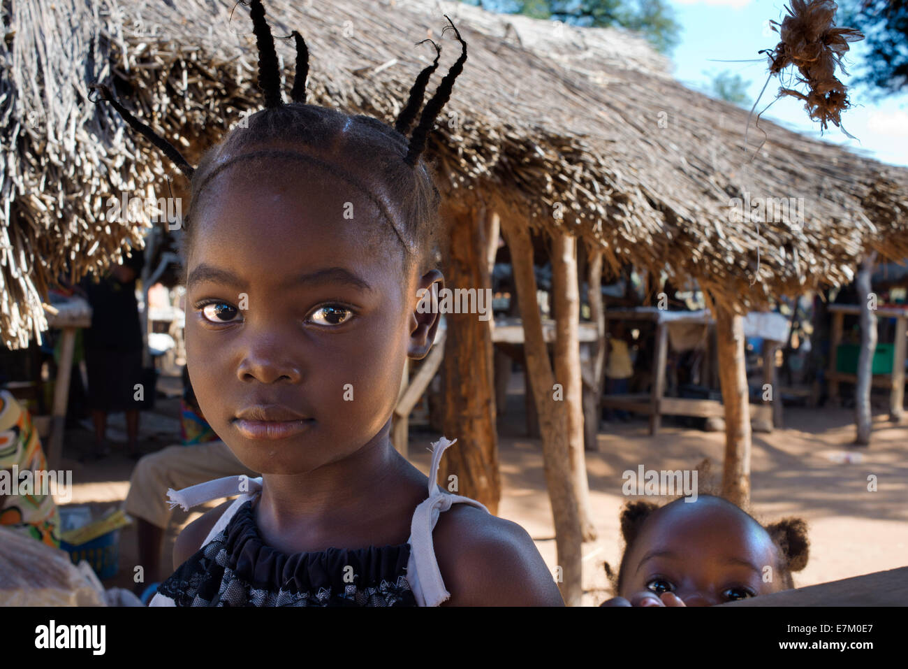 A girl with braids in Mukuni Village. Zabmia. The Mikuni Village is ...