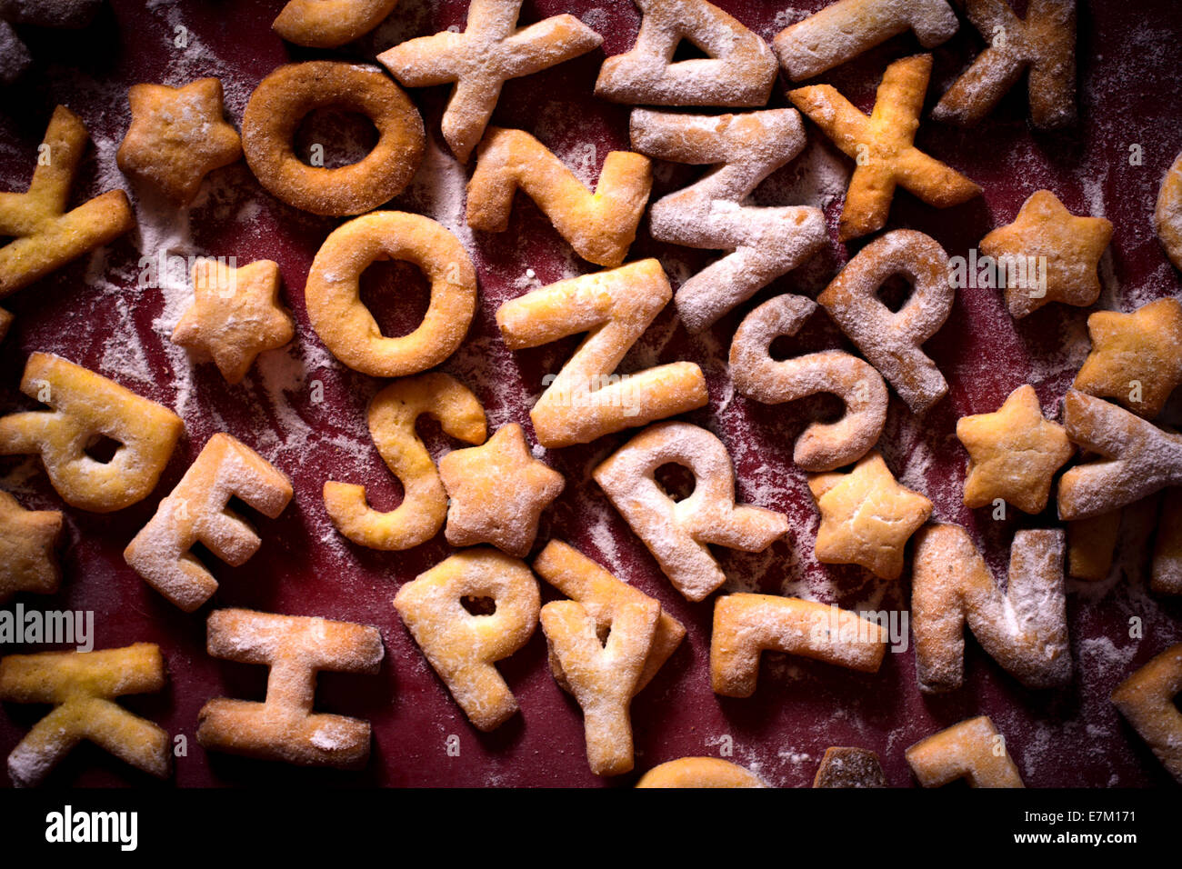 Cookies with letters shapes and sugar powder Stock Photo - Alamy