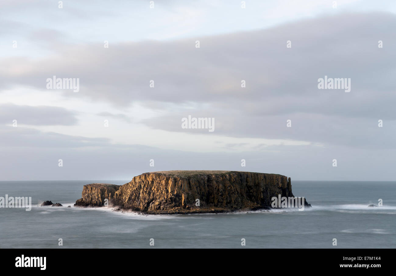 Offshore island at sunset Stock Photo - Alamy
