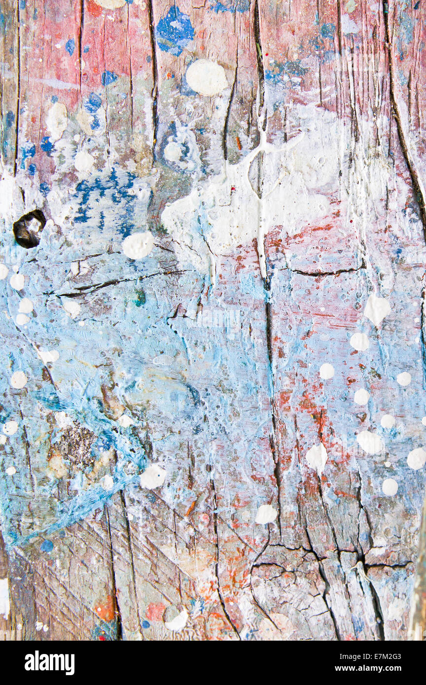 Messy blue red and white paint on a wooden surface Stock Photo - Alamy