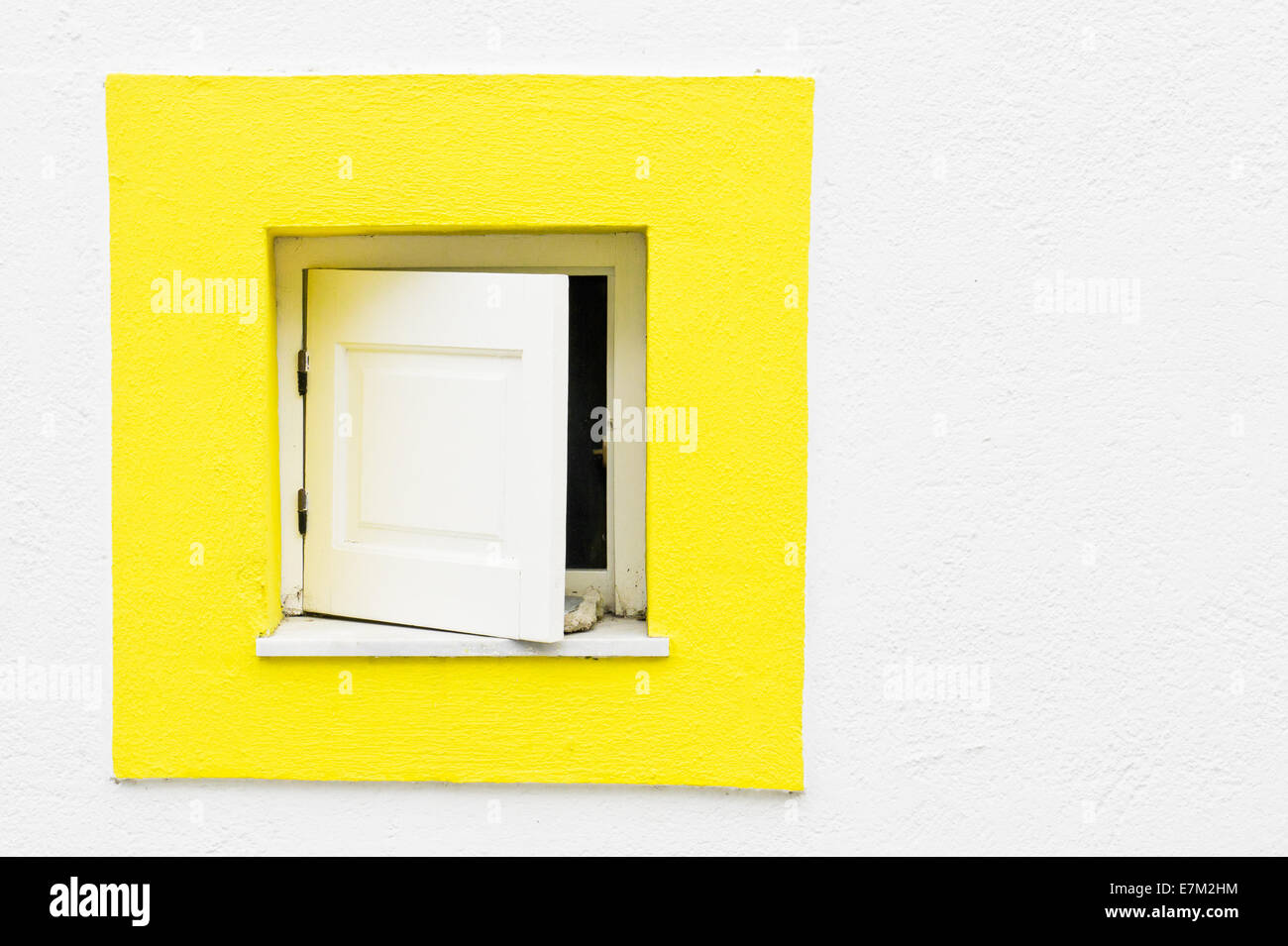 Square yellow window frame in white wall Stock Photo - Alamy