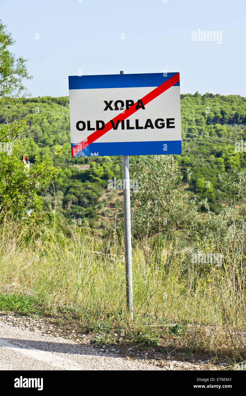 A roadside sign at the edge of the Old Village in Alonissos, Greece ...