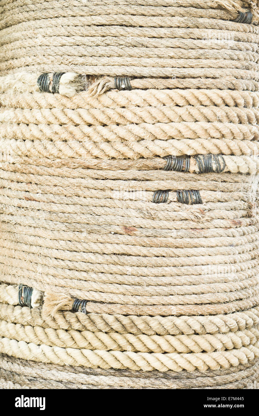 Close up of rope tied round a cylinder, as a background Stock Photo - Alamy