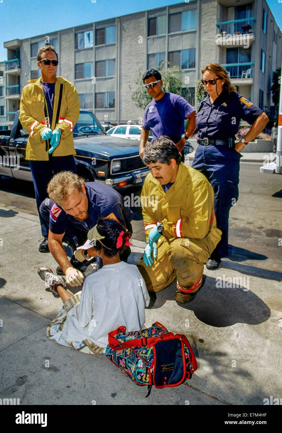 San Diego Fire Department paramedics aid an African American injured ...
