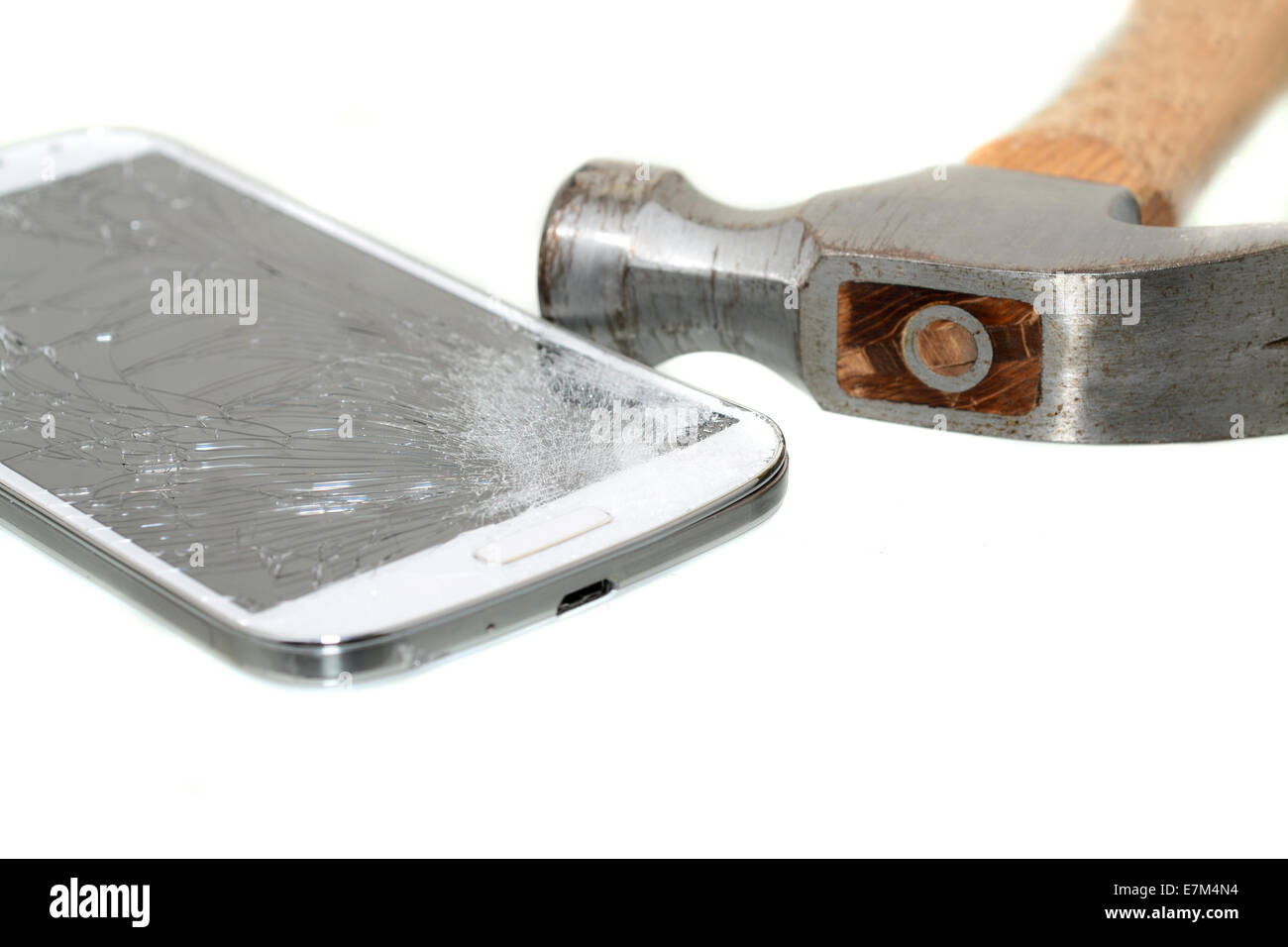 Hammer and cell phone with broken screen isolated on white Stock Photo ...