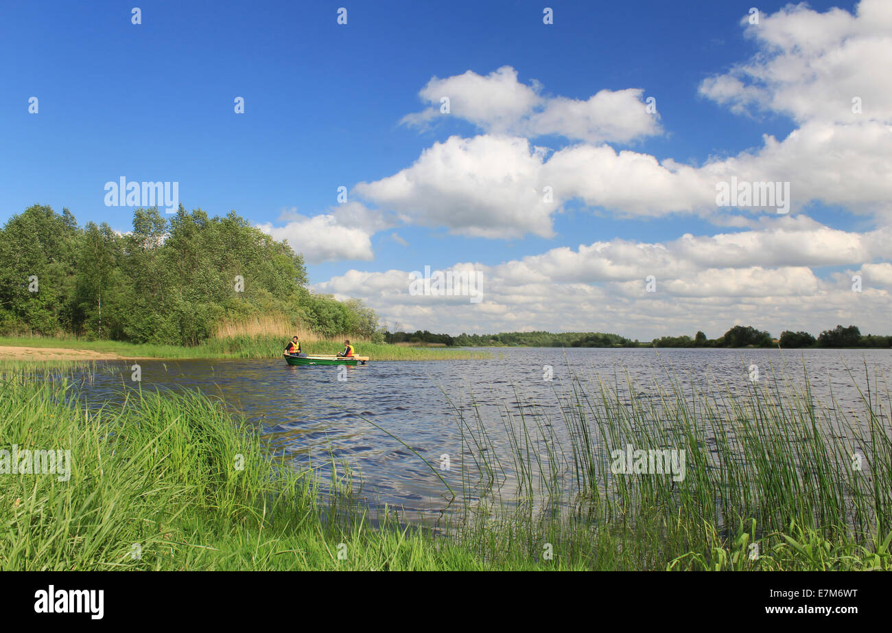 Two fishing boats fished lake Stock Photo - Alamy